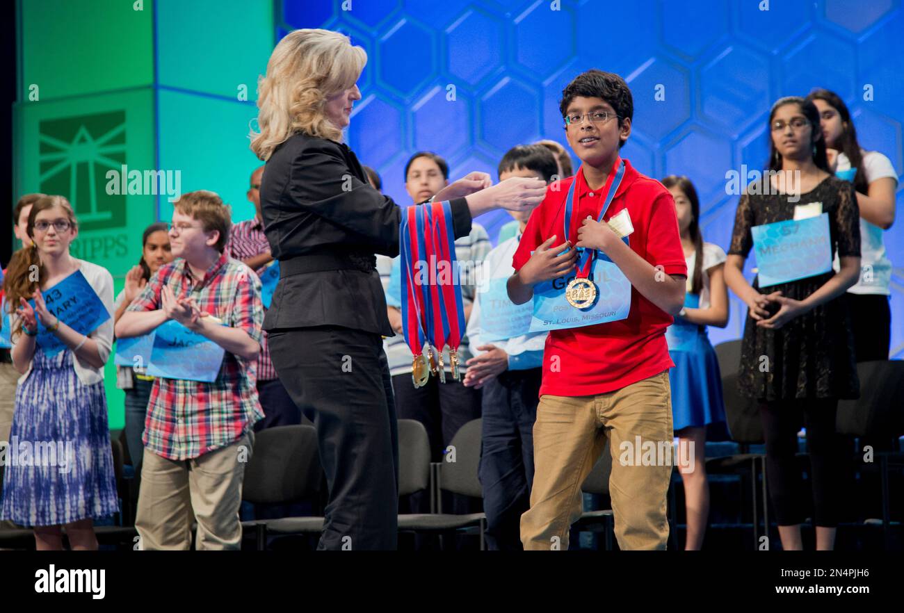 Finalist Gokul Venkatachalam, 13, of Chesterfield, Mo., right, is ...