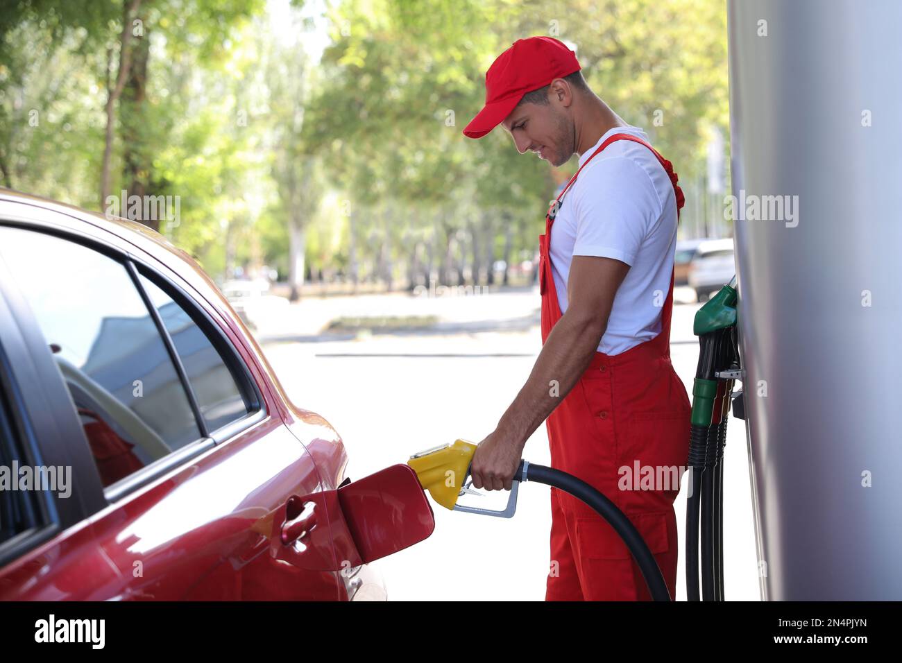 Caucasian male person refueling hi-res stock photography and images - Alamy