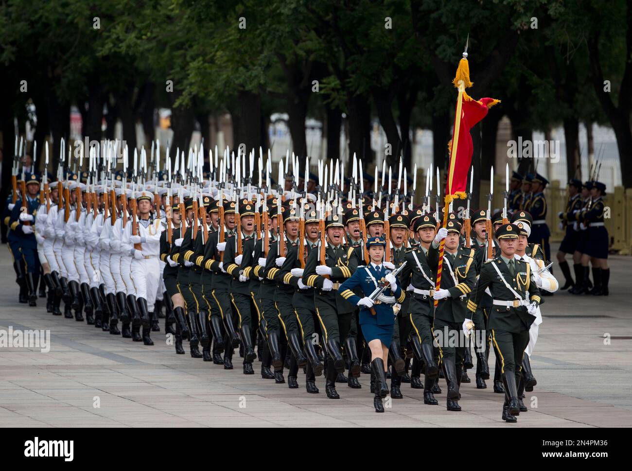 A Chinese honor guard marches during a welcome ceremony for Malaysian ...
