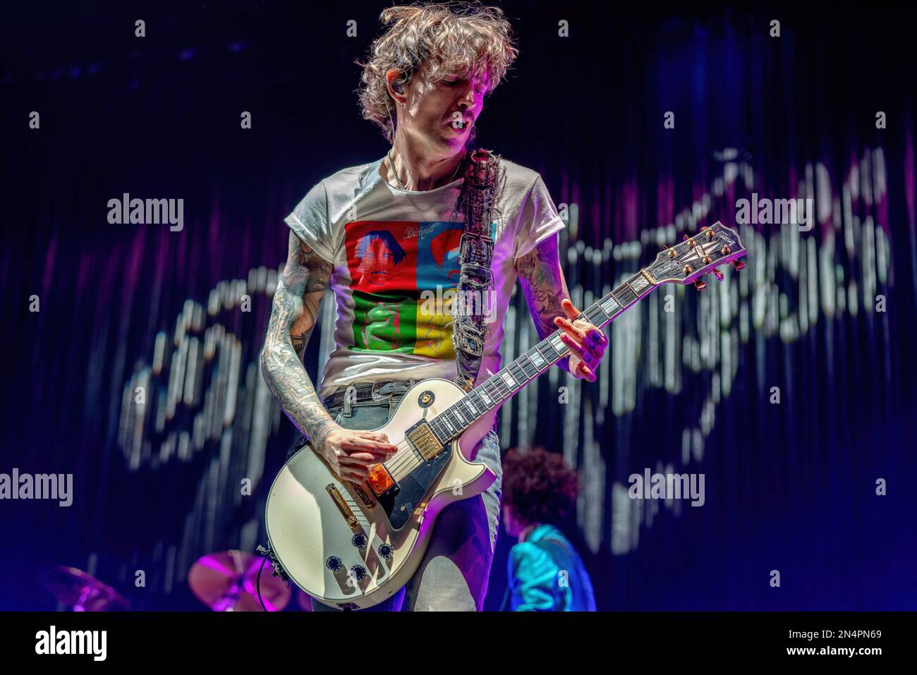 Justin Hawkins of The Darkness on stage at OVO Arena with guitar ...