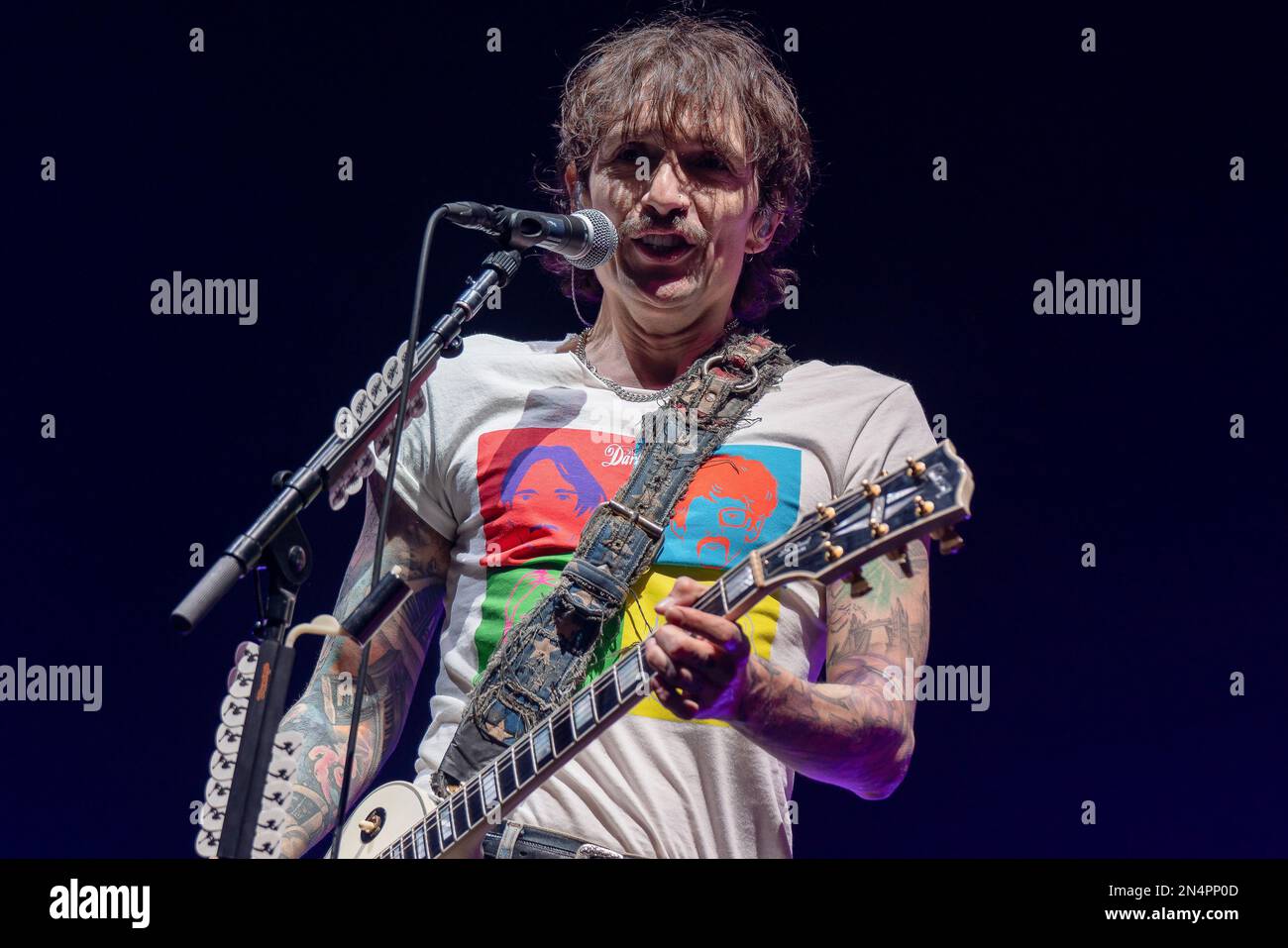 Justin Hawkins of The Darkness on stage at OVO Arena with guitar ...