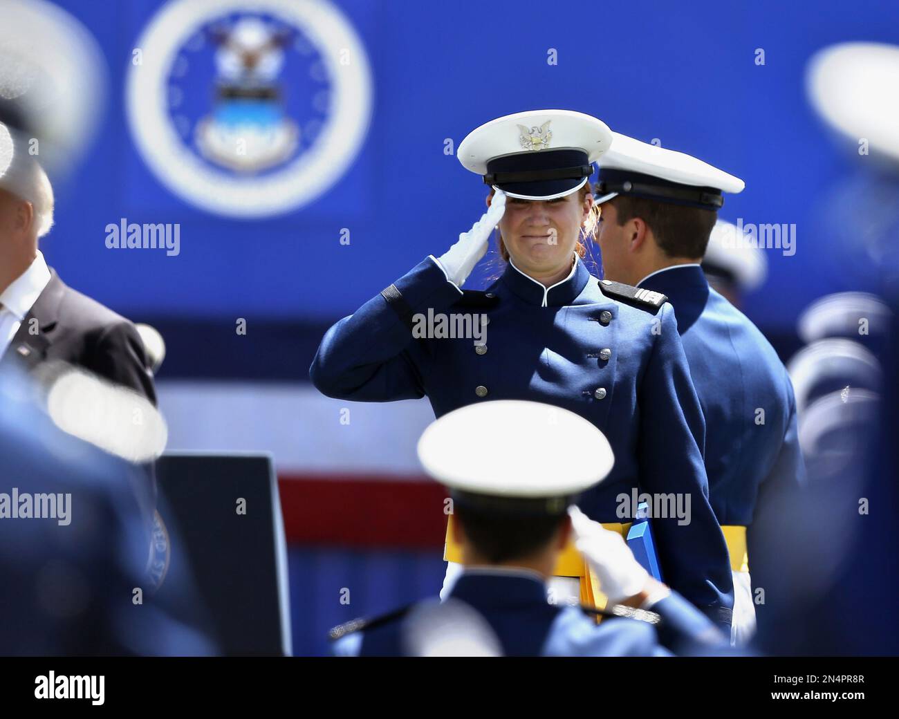 Air Force Cadets from the class of 2014 salute one another as they ...