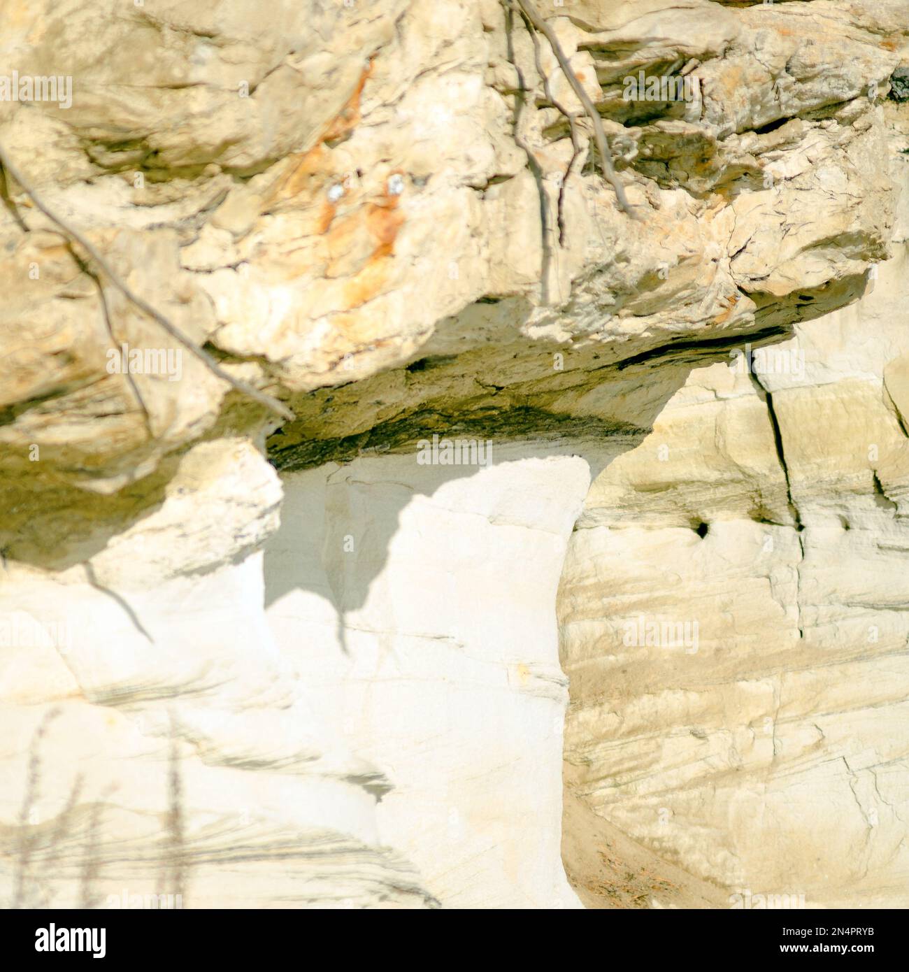 The clay cliff by the river with the beginning of occurrence of erosion ...