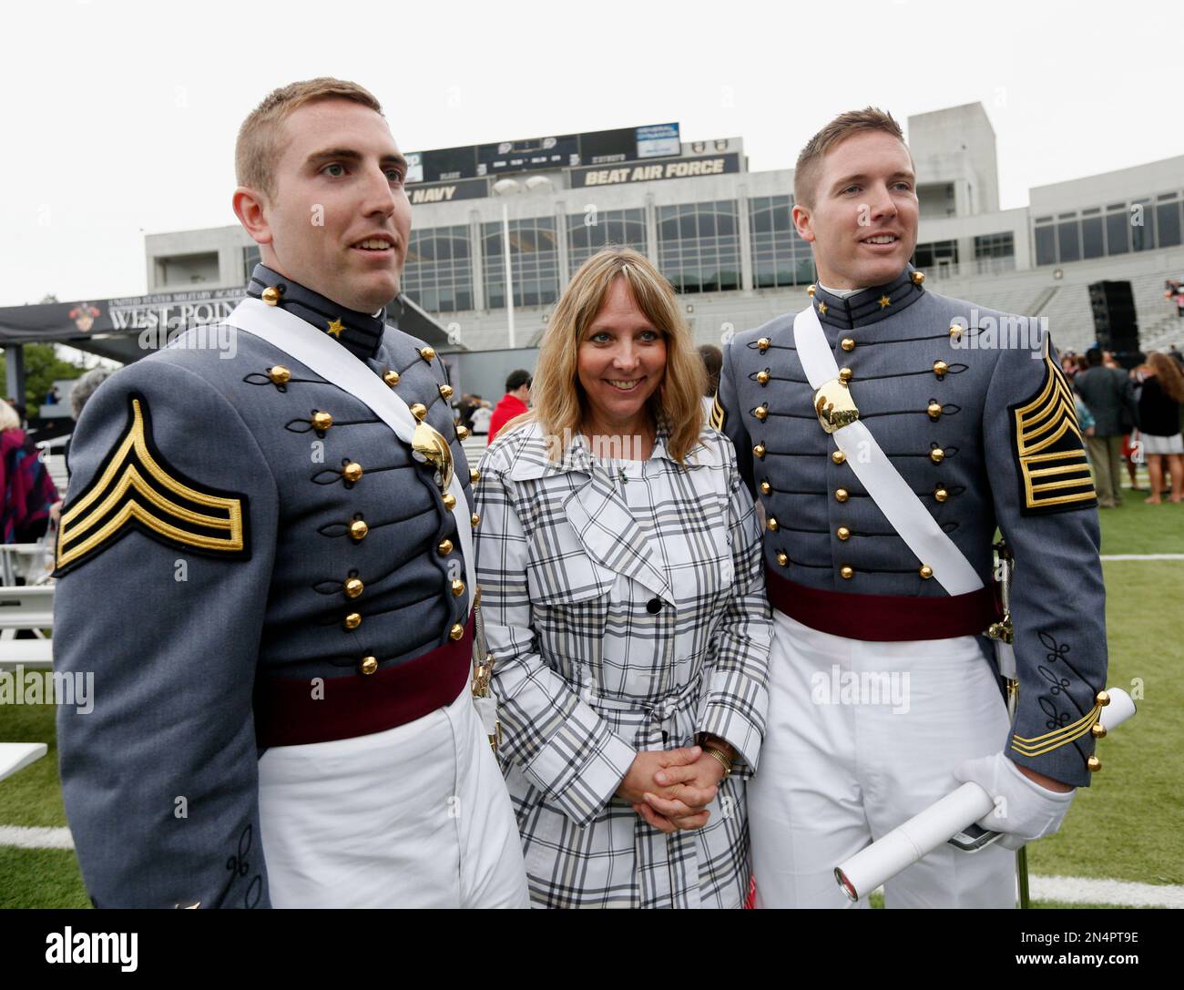 U.S. Military Academy graduates Michael Lesmeister, left, and his ...