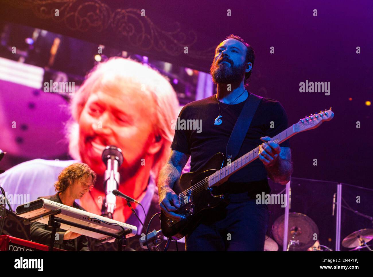 Steve Gibb performs with his father, Barry Gibb of The Bee Gees, during ...