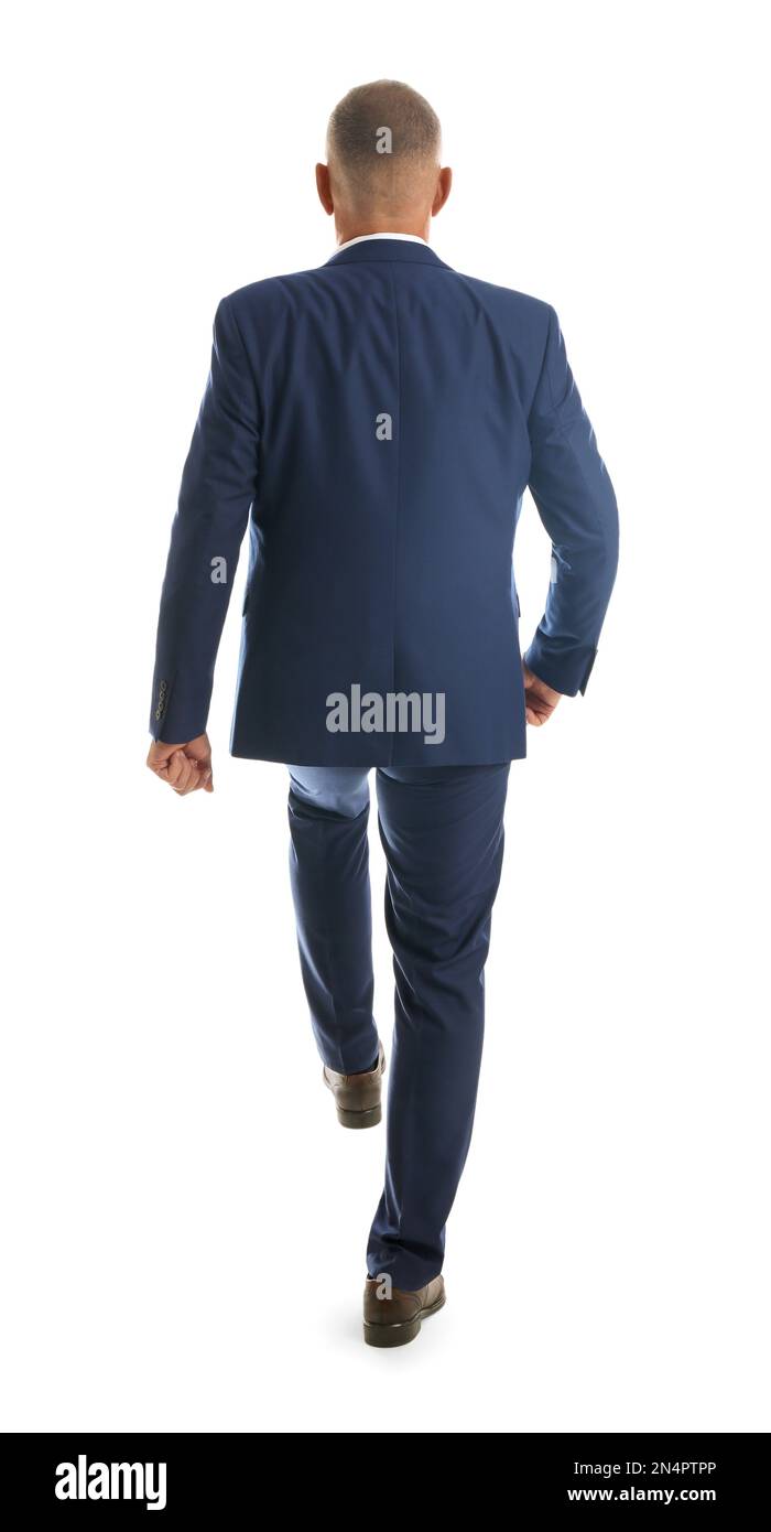 Businessman imitating stepping up on stairs against white background ...