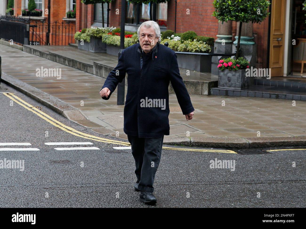 British photographer Terry O'Neil arrives for the memorial of ...