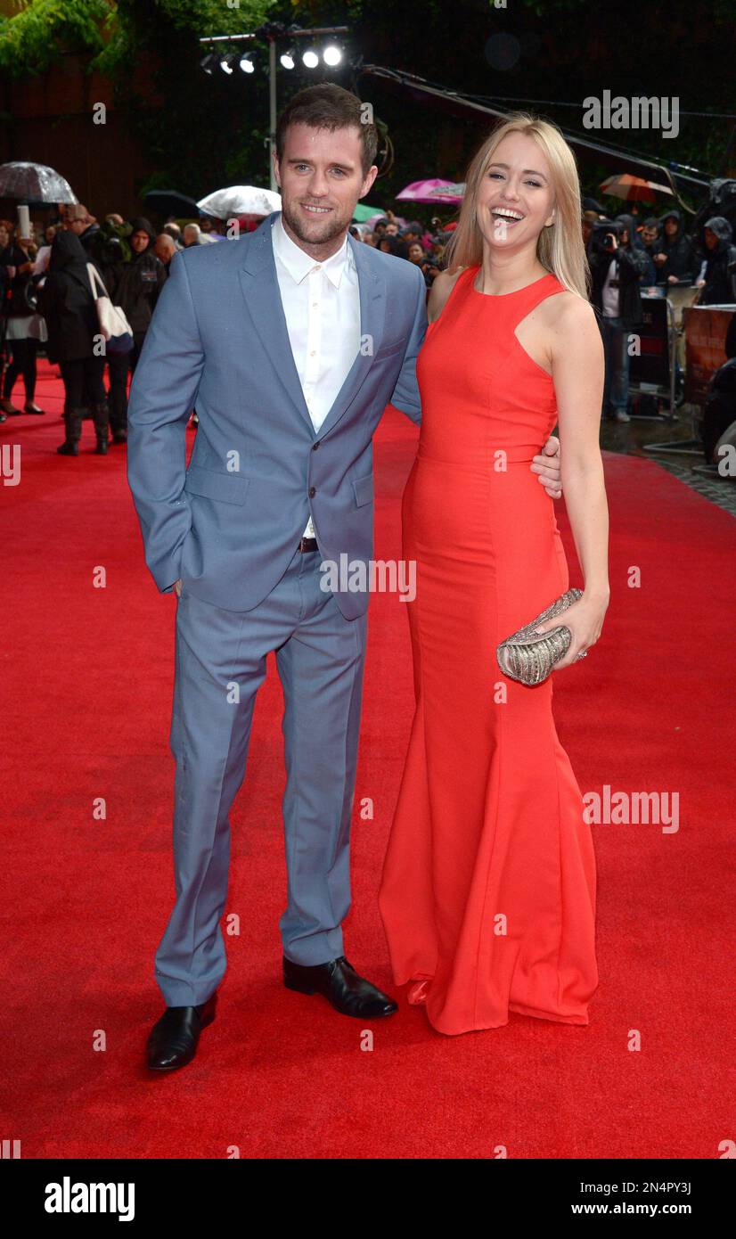 Jonas Armstrong and Sammy Windward pose for photographers at the Edge ...