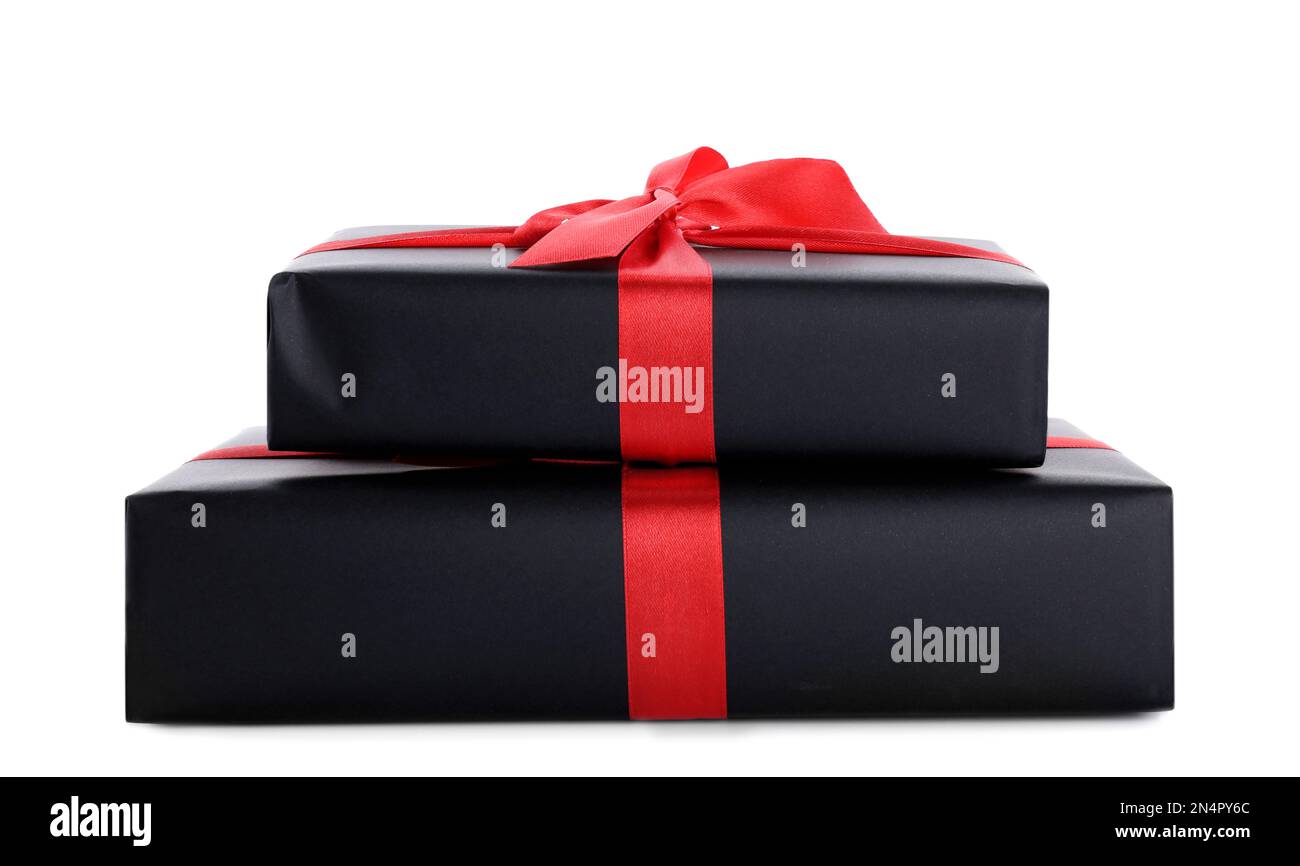 Black gift boxes with bows isolated on white Stock Photo - Alamy