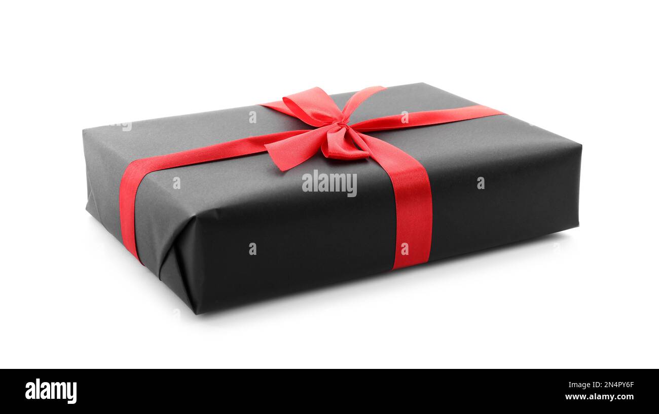 Black gift box with bow isolated on white Stock Photo - Alamy