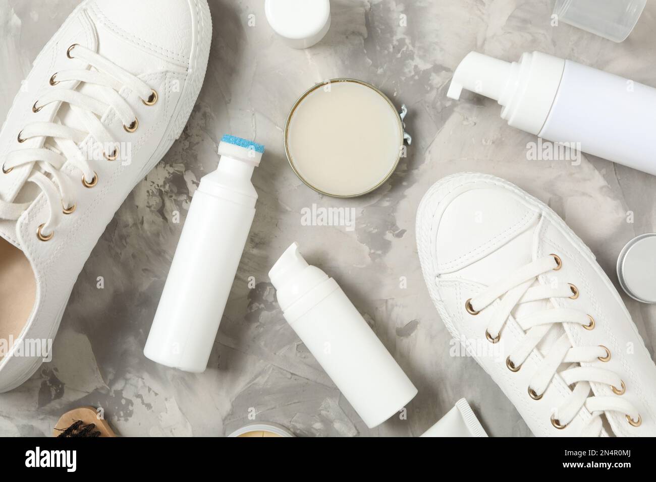 Flat lay composition with stylish footwear and shoe care accessories on ...