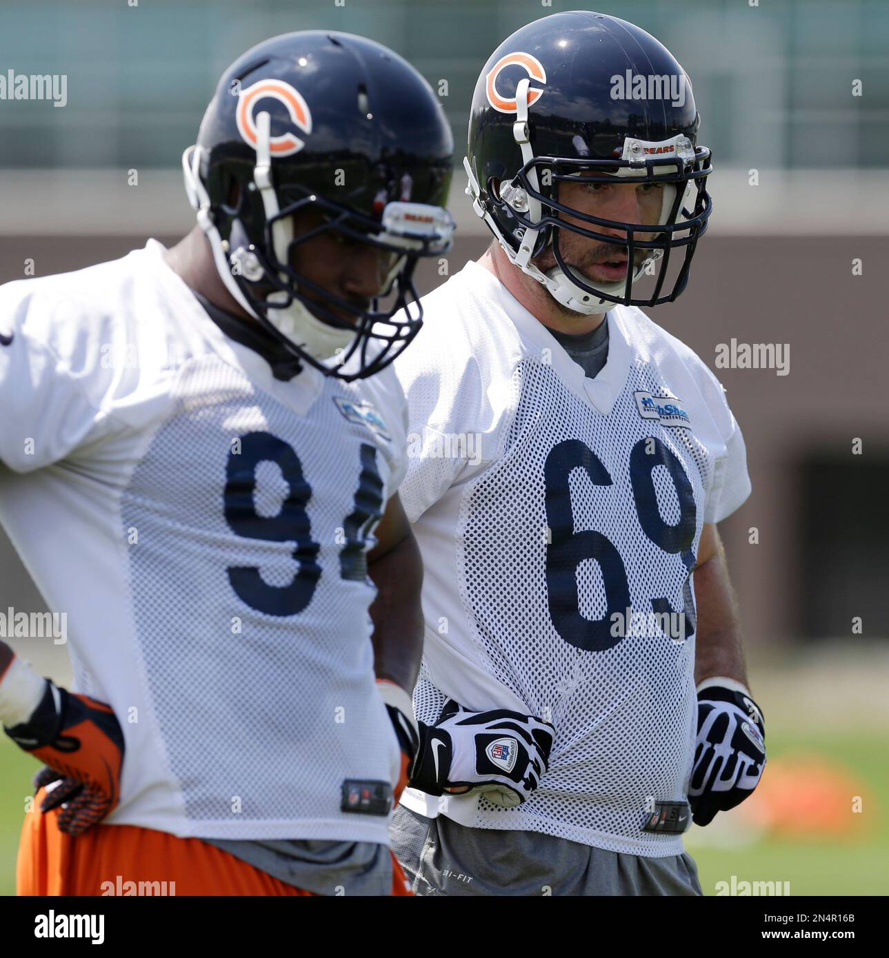 Chicago Bears defensive end Jared Allen (69), right, and defensive end ...