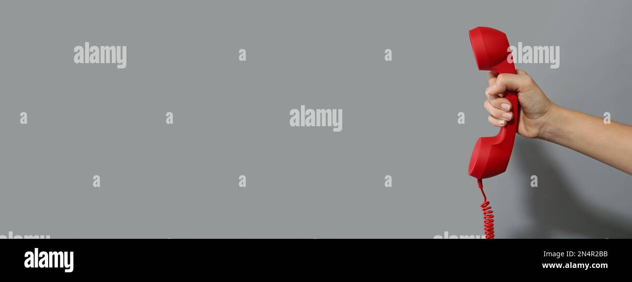 Hotline service. Woman with telephone receiver and space for text on ...