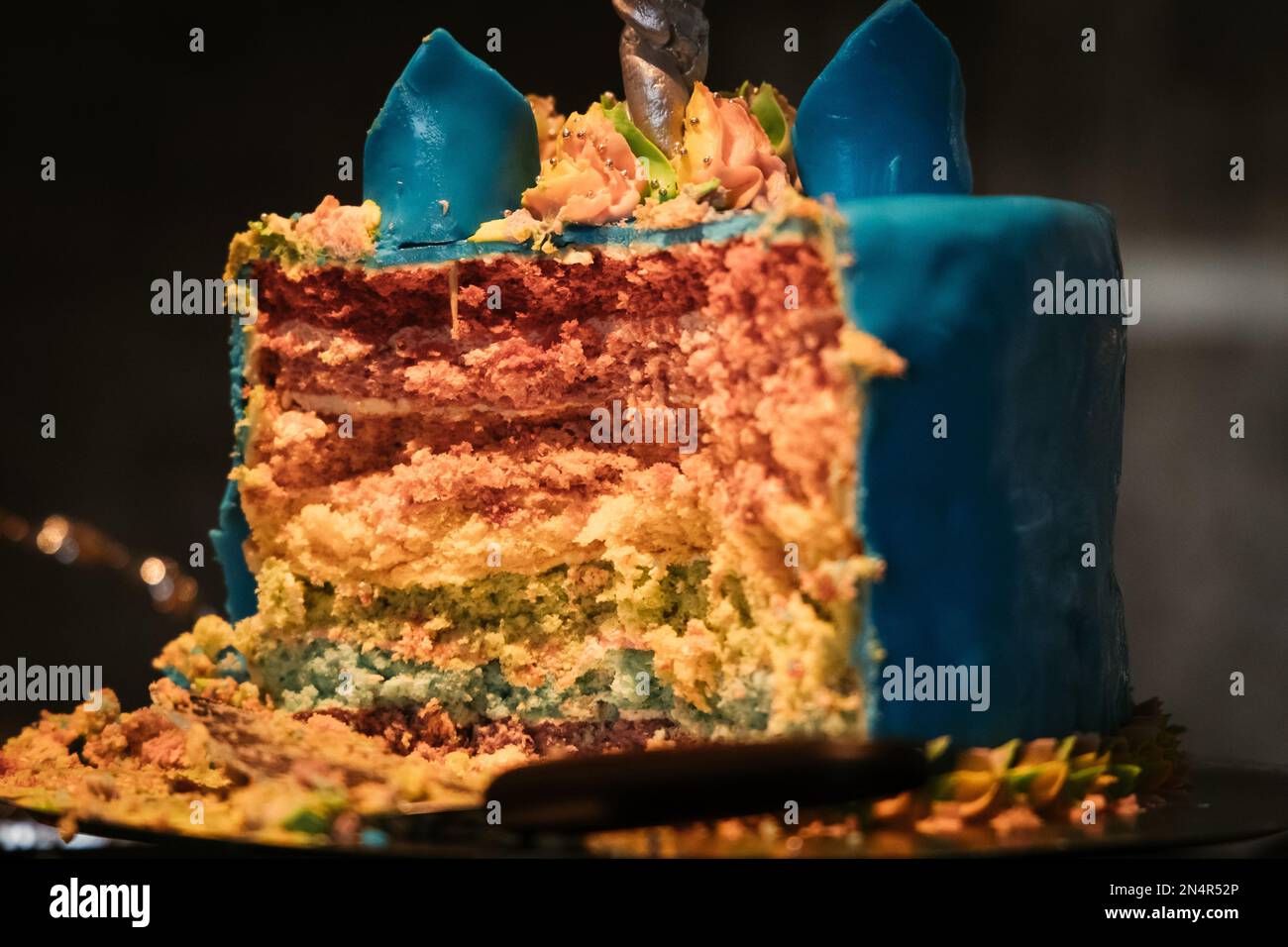 A close up of a cut birthday cake Stock Photo - Alamy