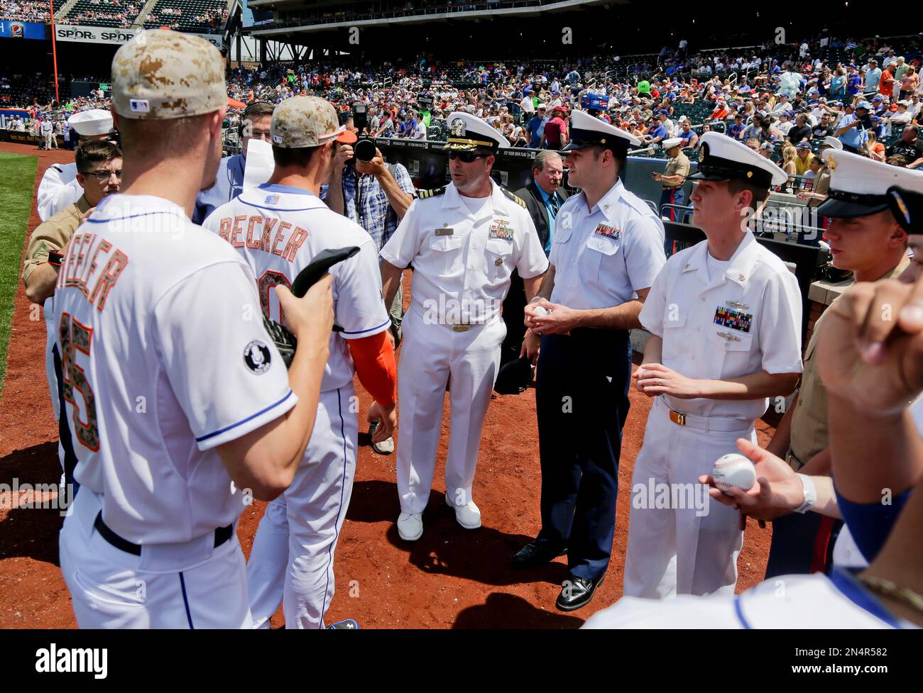 Various members of the military meet with New York Mets players before ...