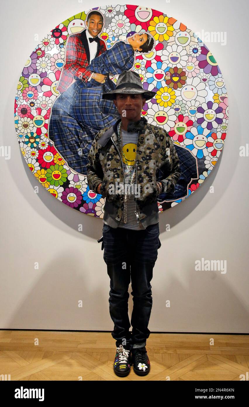 US singer Pharrell Williams poses during a press conference for the ...