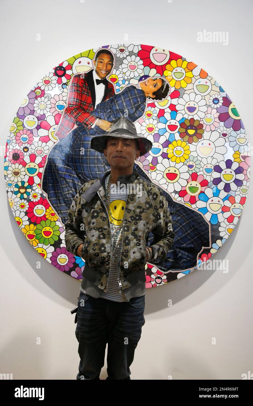 US singer Pharrell Williams poses during a press conference for the ...