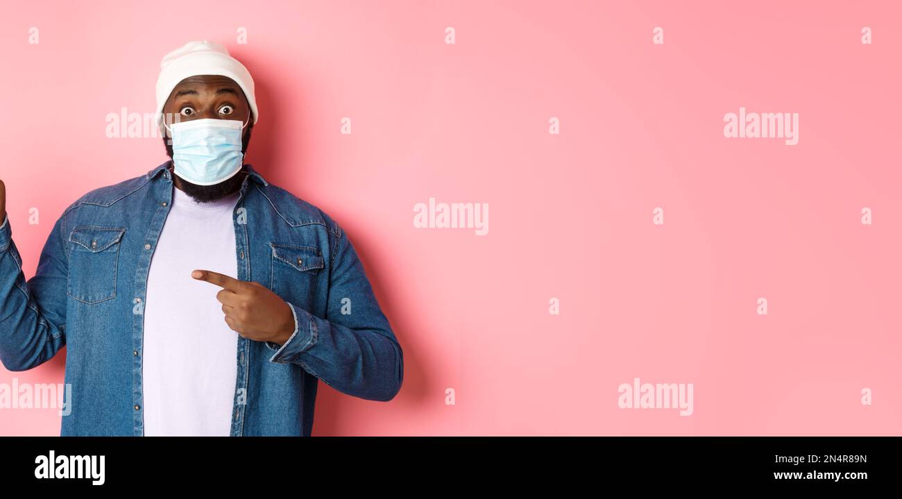 Coronavirus, lifestyle and global pandemic concept. Amazed black man in ...