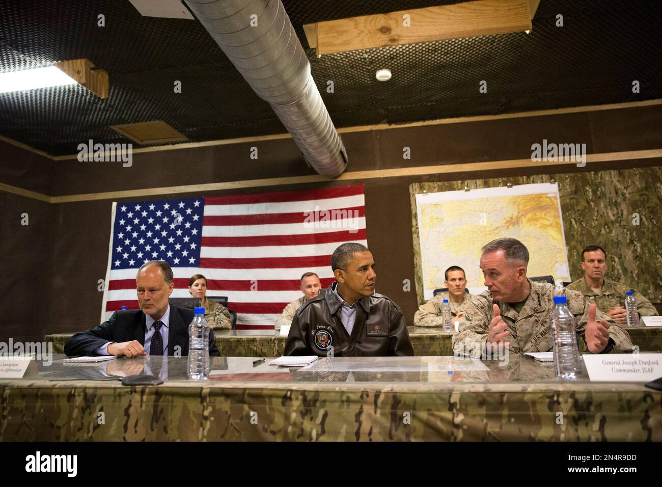 President Barack Obama, center, is briefed by Marine General Joseph ...
