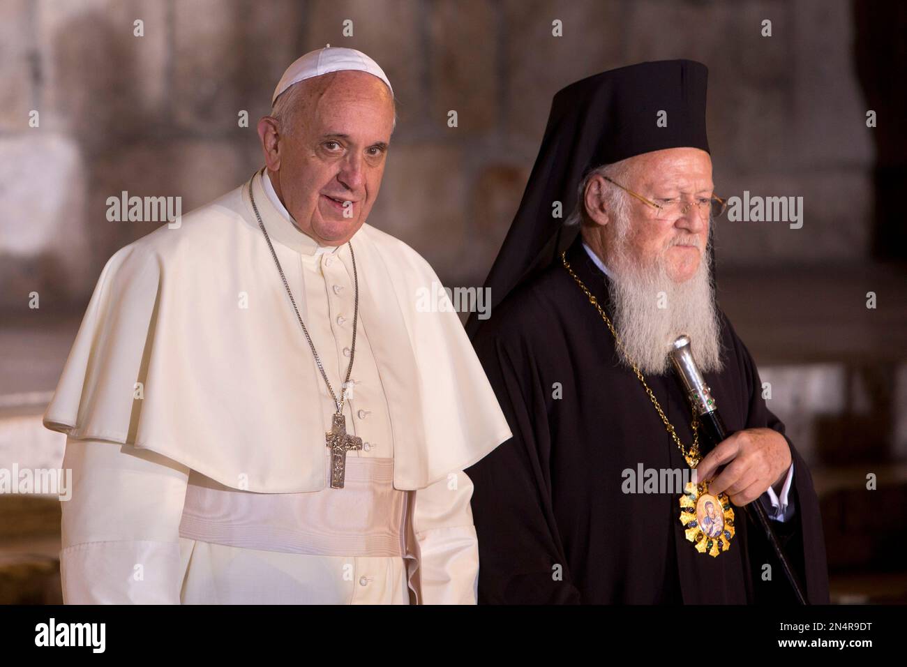 Pope Francis stands with Ecumenical Patriarch Bartholomew I as they ...