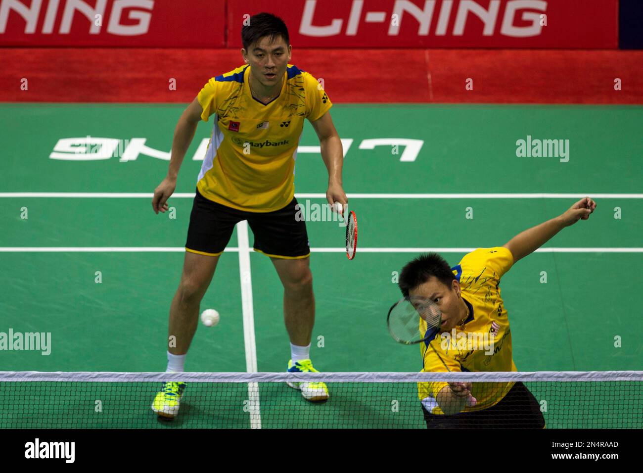 Malaysia's Hoon Thien How, right and Tan Boon Heong play against Japan ...