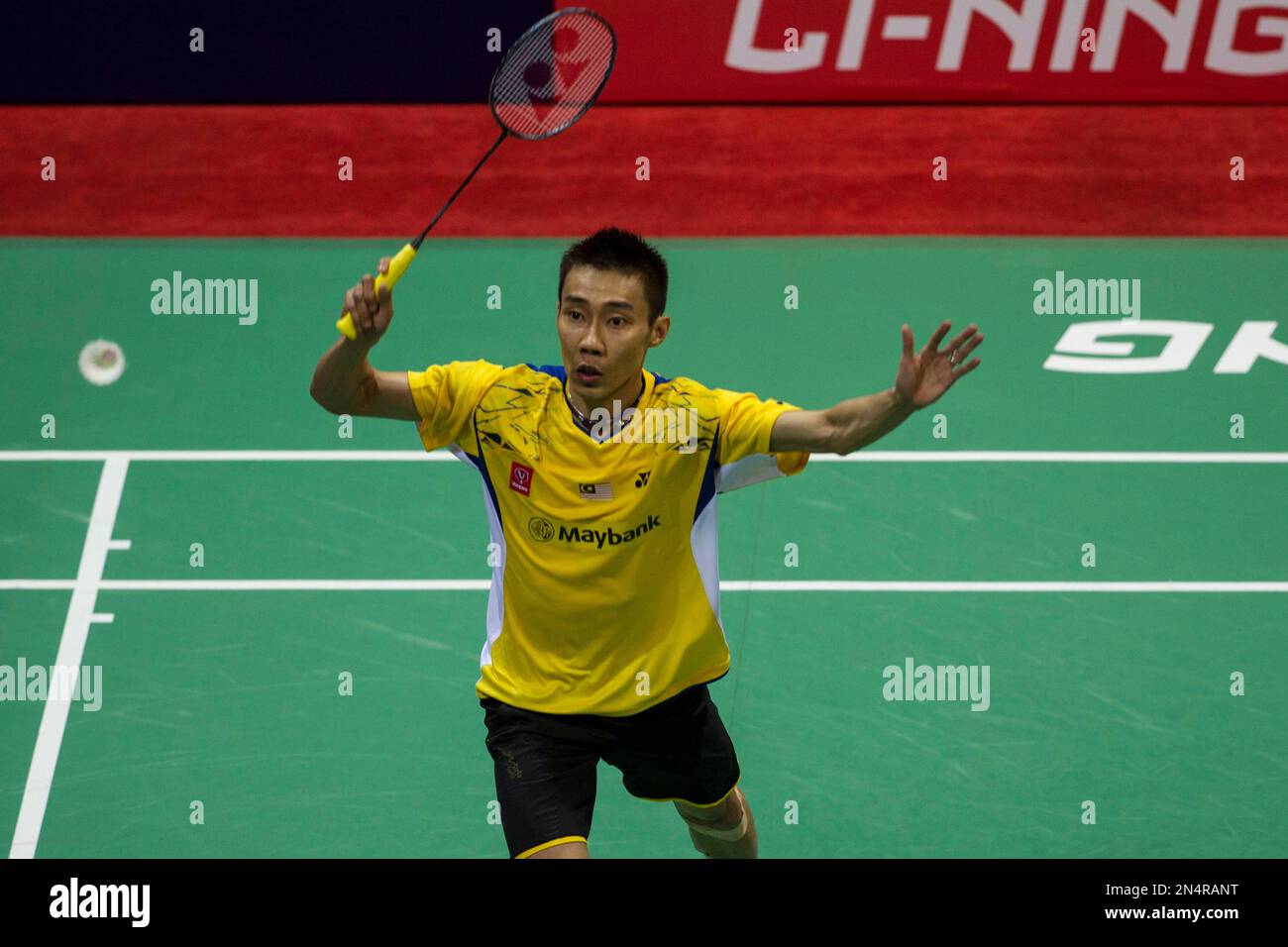 Malaysia's Lee Chong Wei plays against Japan's Kenichi Tago during the final singles match at ...