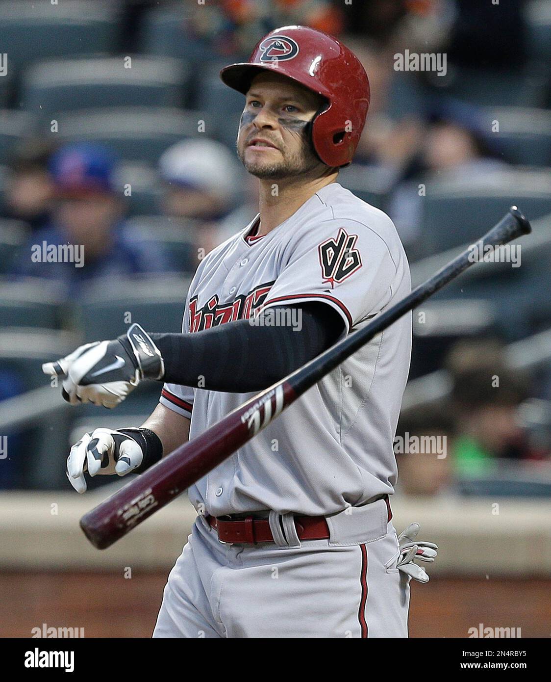 Arizona Diamondbacks left fielder Cody Ross (7) tosses his bat after ...