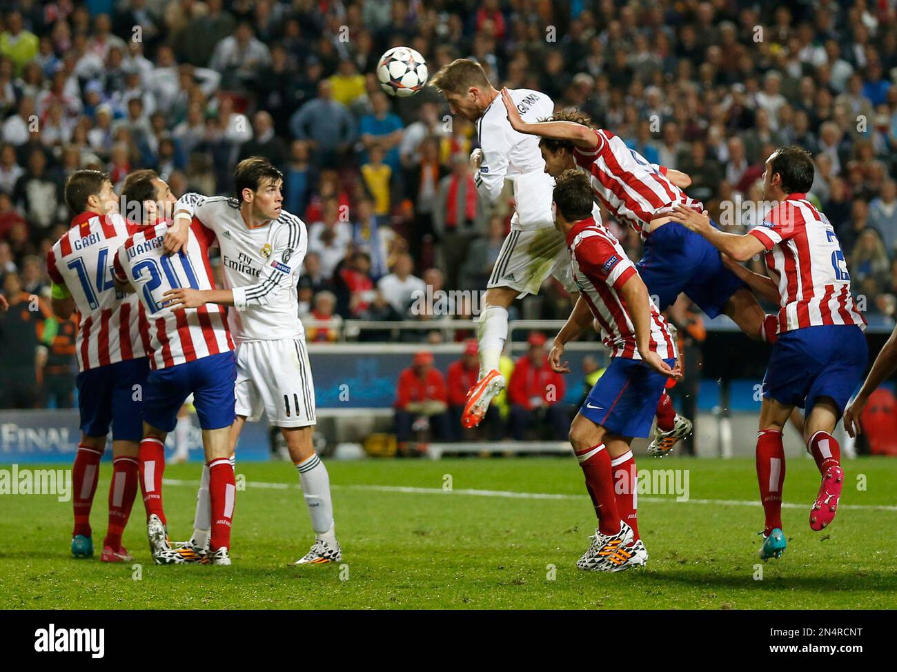 Real Madrid's Sergio Ramos, center, scores his side's first goal during ...