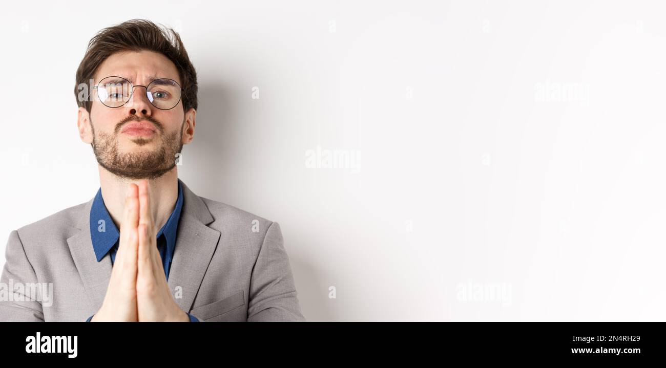 Clingy guy in glasses asking for last favour, begging for help and ...