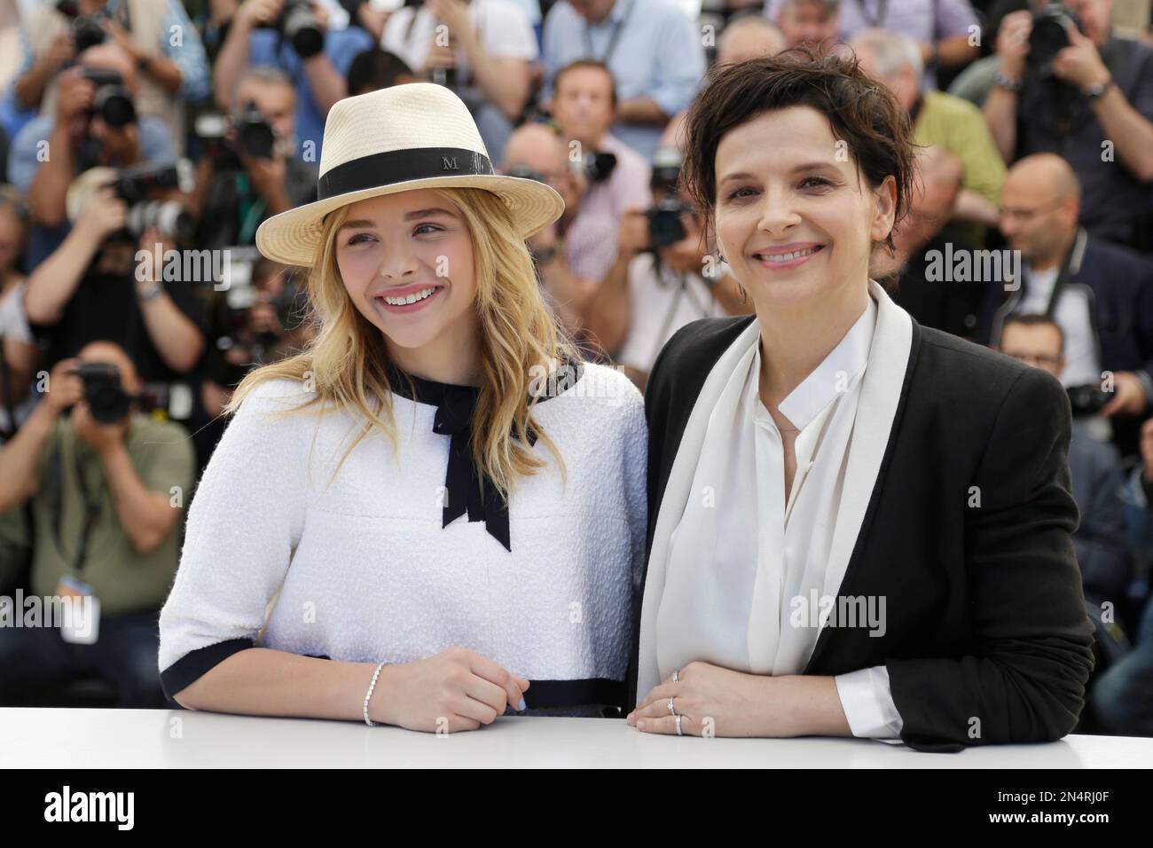 Actress Chloe Grace Moretz, left, and actress Juliette Binoche pose for ...