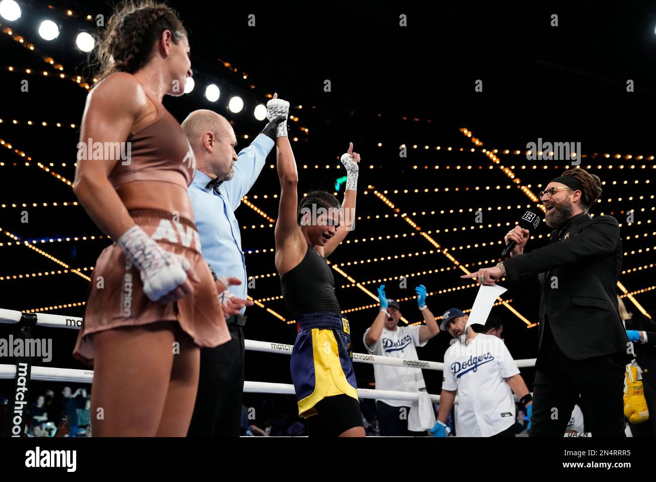 England's Ramla Ali reacts after beating Australia's Avril Mathie, left ...