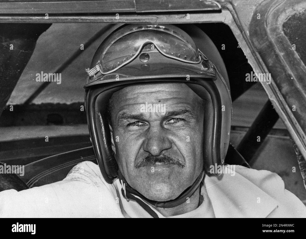 FILE - In this Aug. 1, 1969, file photo, Wendell Scott sits in a race ...