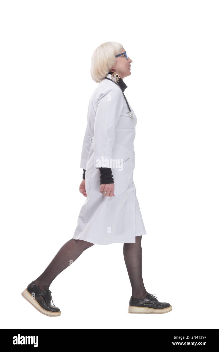 full length. friendly woman doctor walking forward Stock Photo - Alamy