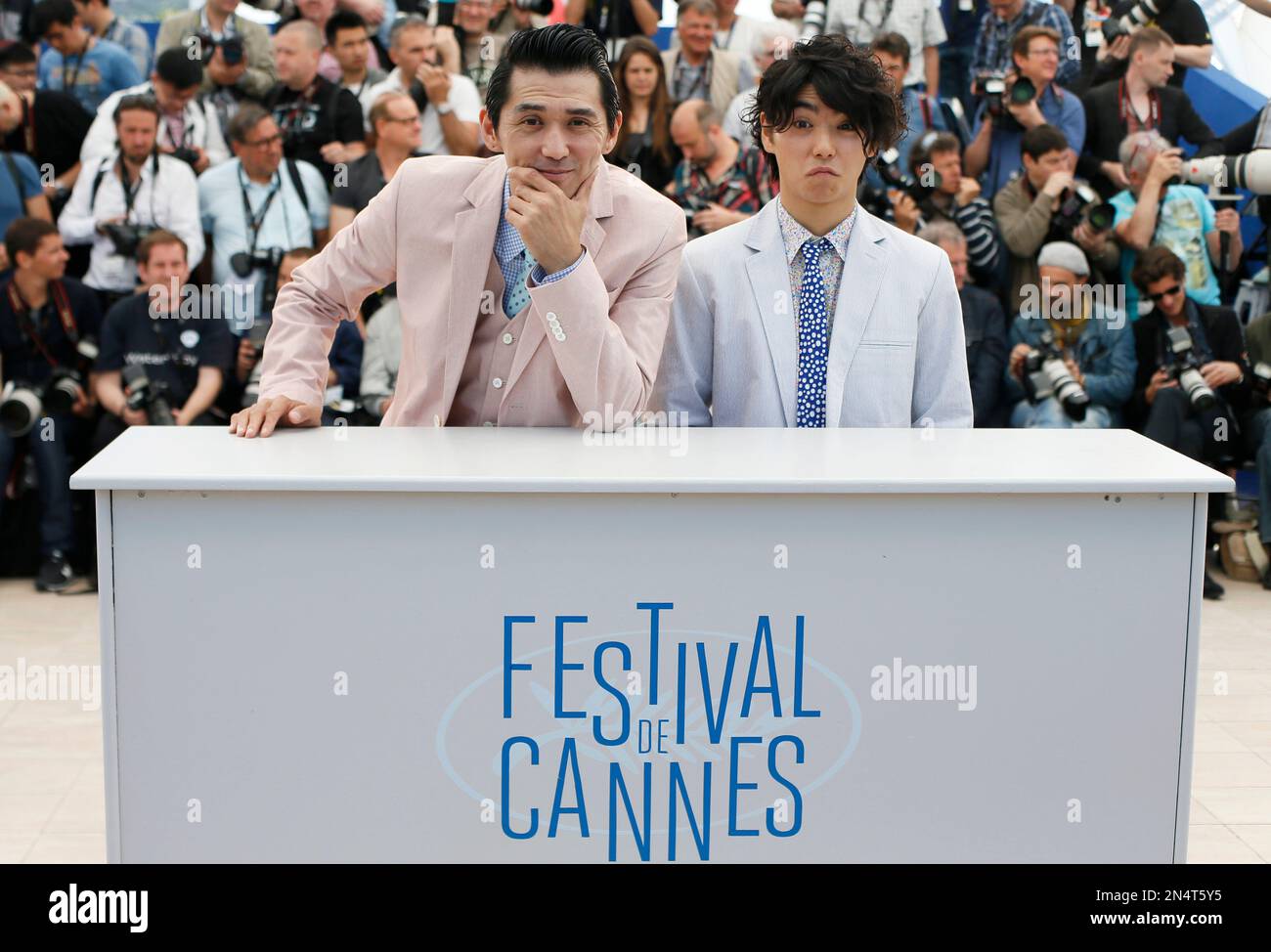 Actors Jun Murakami, left, and Nijiro Murakami poses for photographers ...