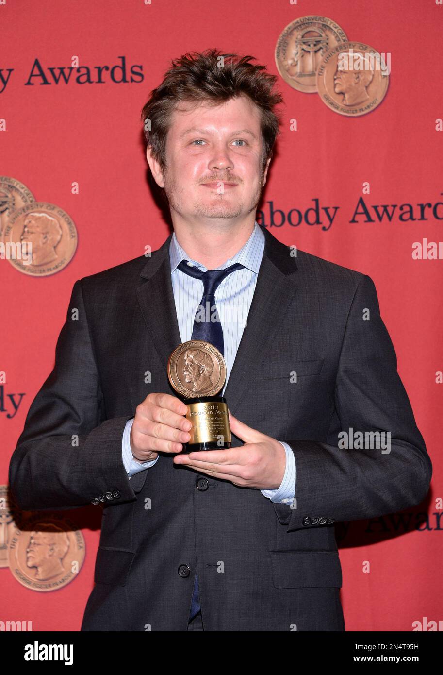 Writer and producer Beau Willimon poses with his award for Netflix's ...
