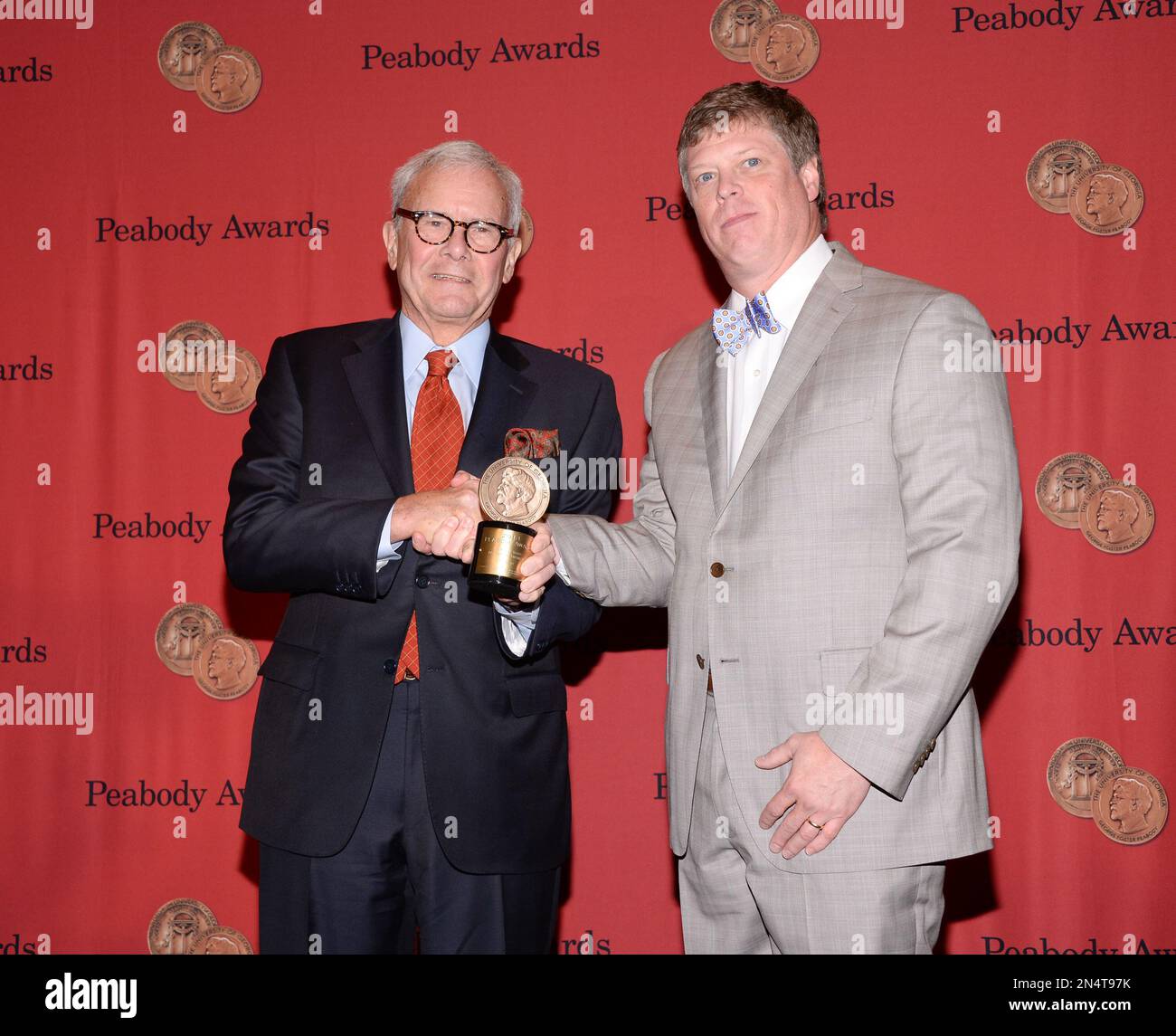 Former NBC news anchor Tom Brokaw, left, poses with Peabody Awards ...