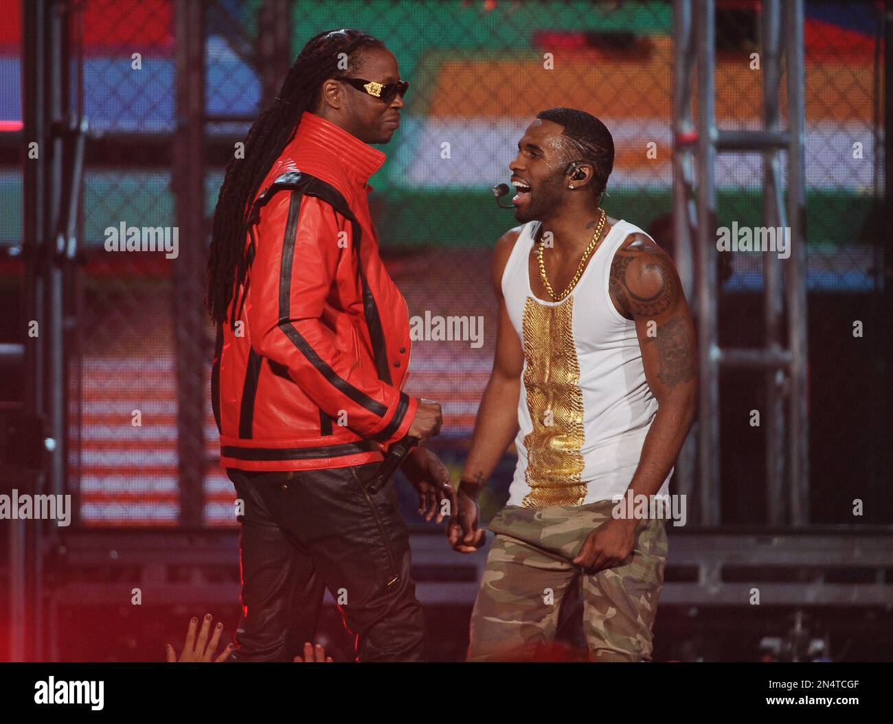 2 Chainz, left, and Jason Derulo perform on stage at the Billboard ...