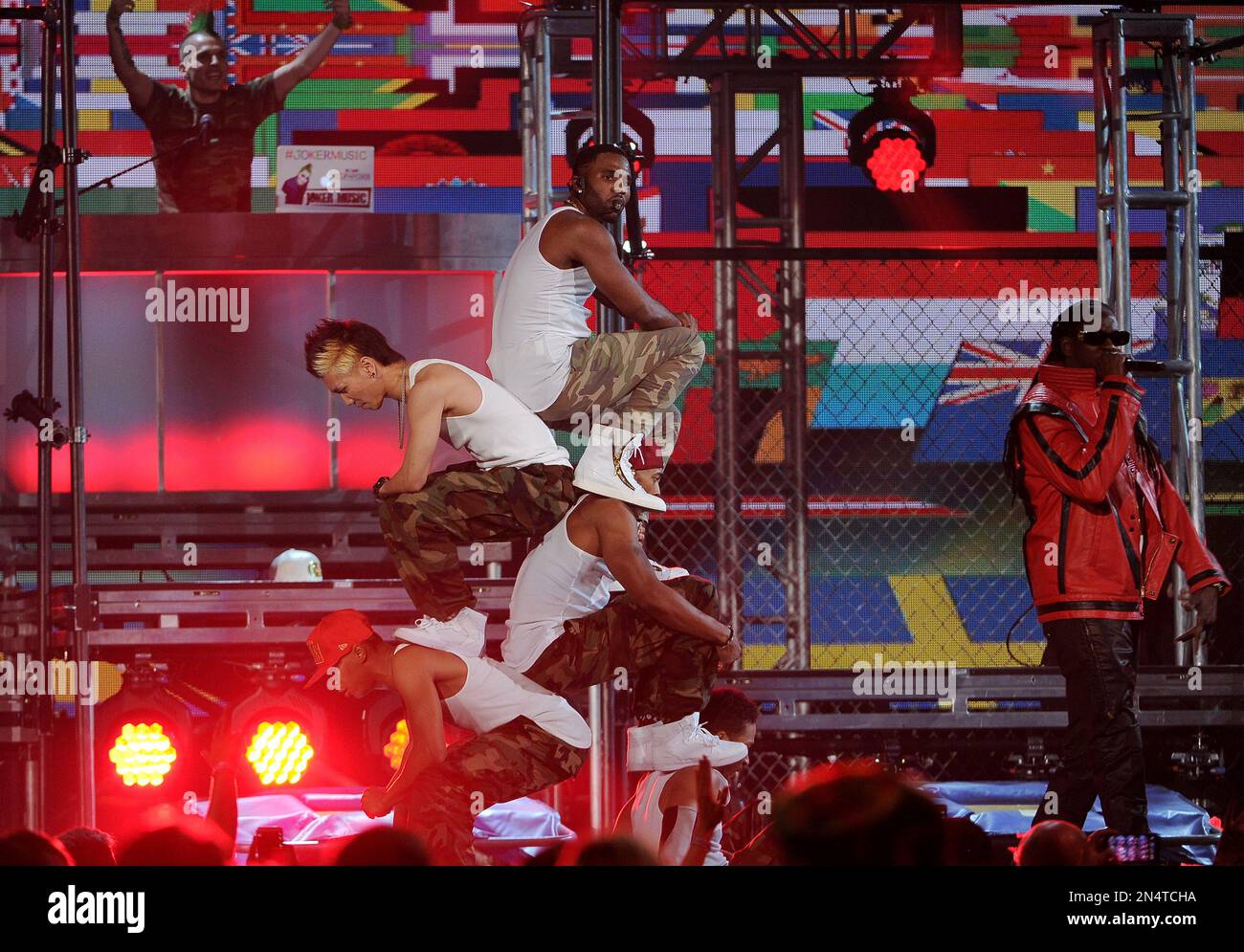 Jason Derulo, top left, and 2 Chainz, far right, perform on stage at ...