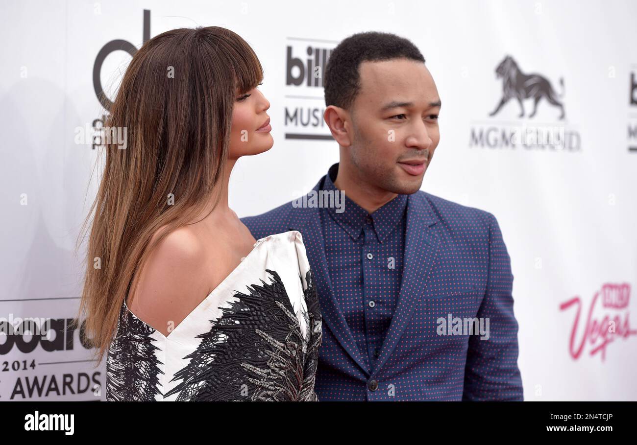 Chrissy Teigen, left, and John Legend arrive at the Billboard Music ...