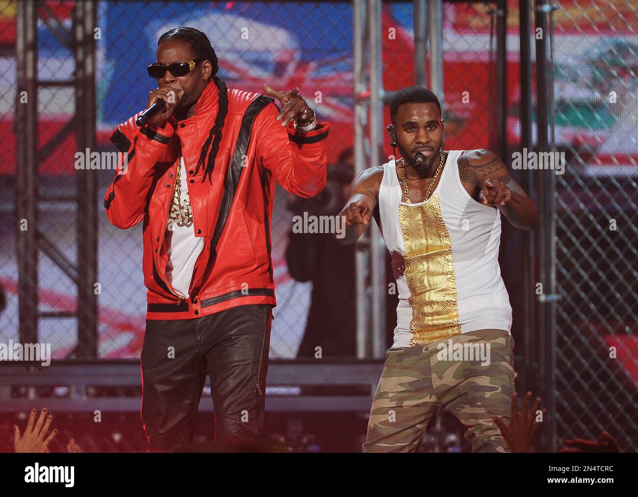 2 Chainz, left, and Jason Derulo perform on stage at the Billboard ...