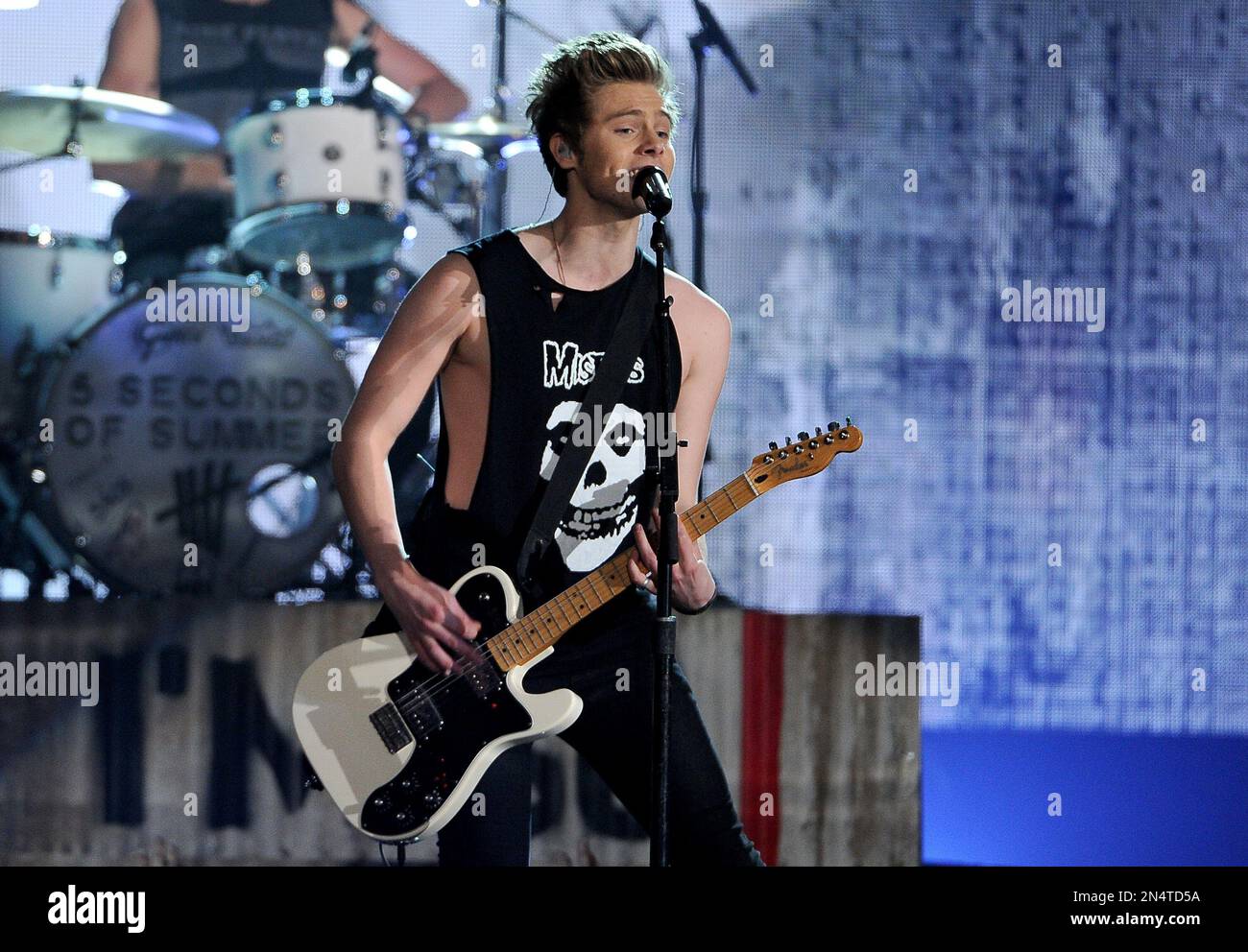 Luke Hemmings, of the musical group 5 Seconds of Summer, performs on ...
