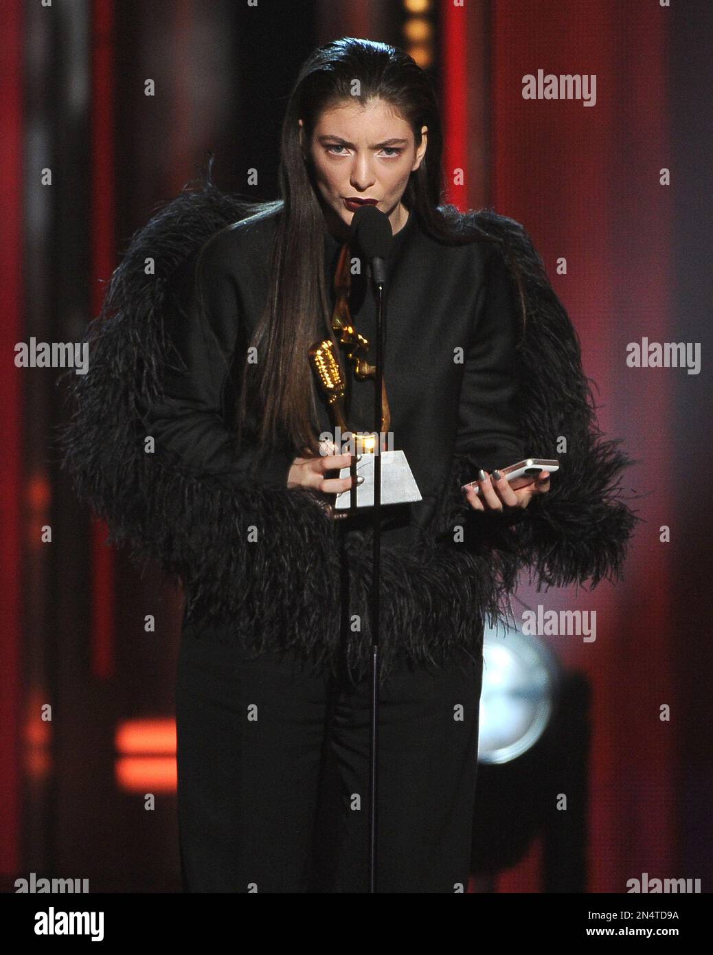 Lorde accepts the award for top new artist at the Billboard Music ...