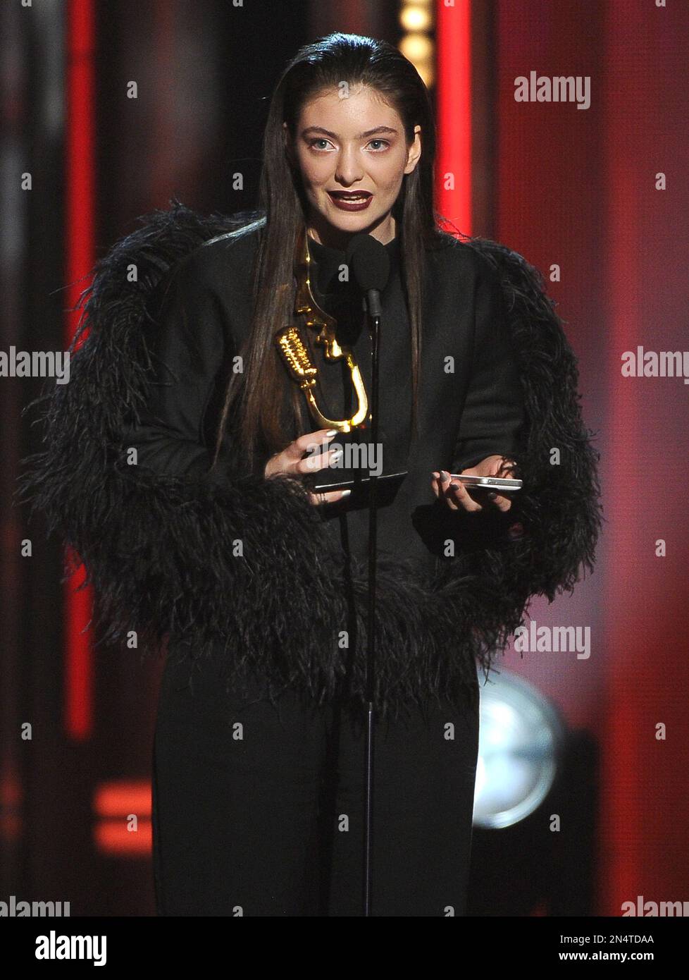 Lorde accepts the award for top new artist at the Billboard Music ...