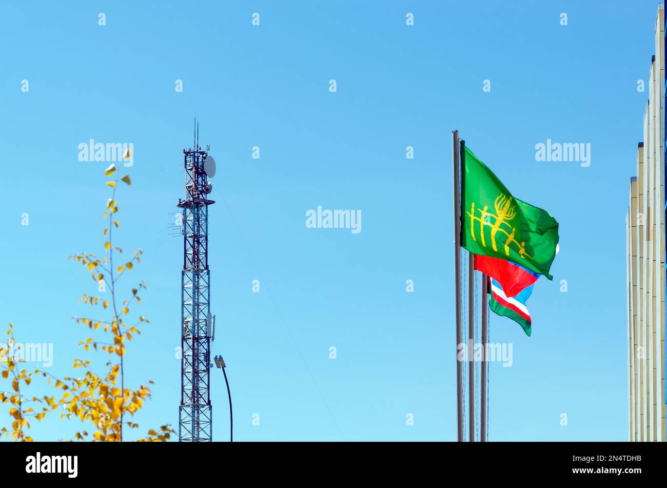 Three flags of Russia, Yakutia, and the village of ulus Suntara develop ...