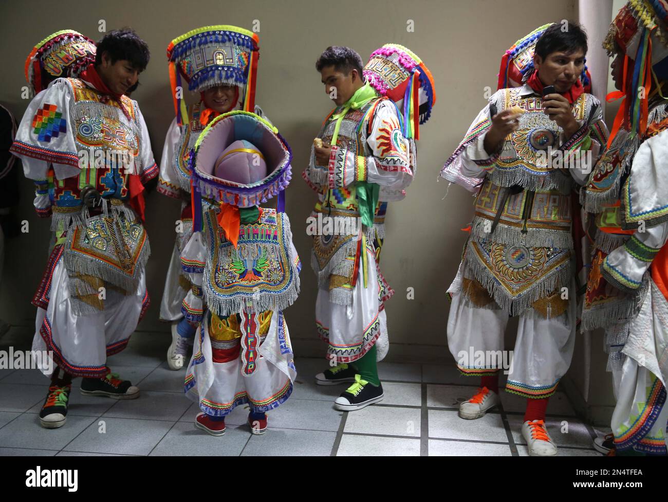 A scissors dancers rest a before of Scissor dance competition in Lima ...