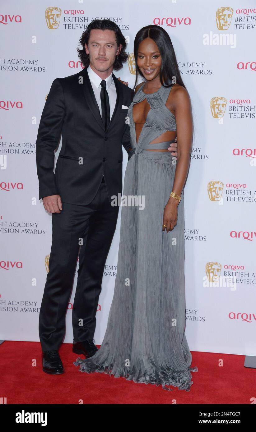 Luke Evans with Naomi Campbell in the Awards Room at the Arquiva Bafta ...