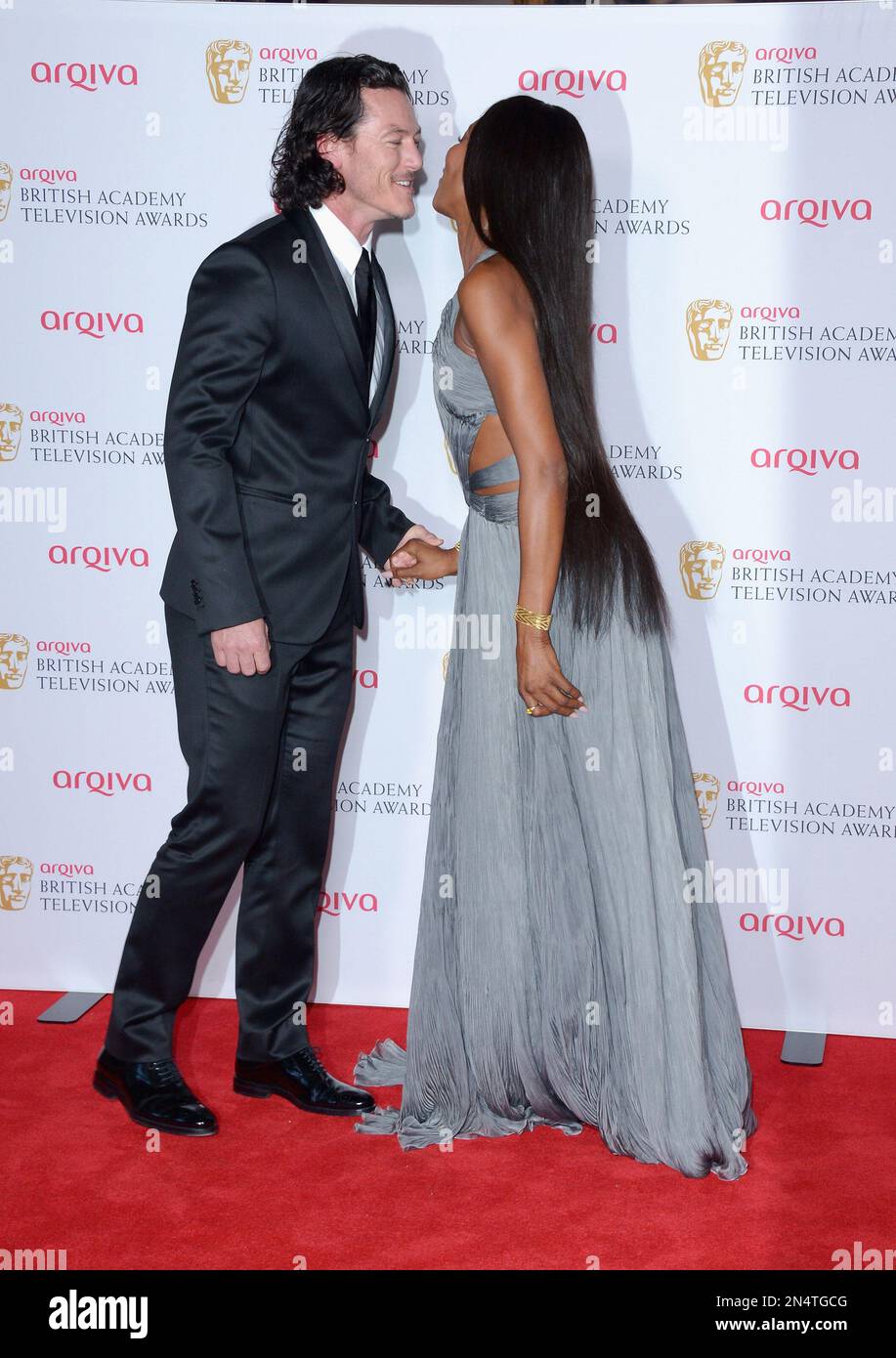 Luke Evans with Naomi Campbell in the Awards Room at the Arquiva Bafta ...