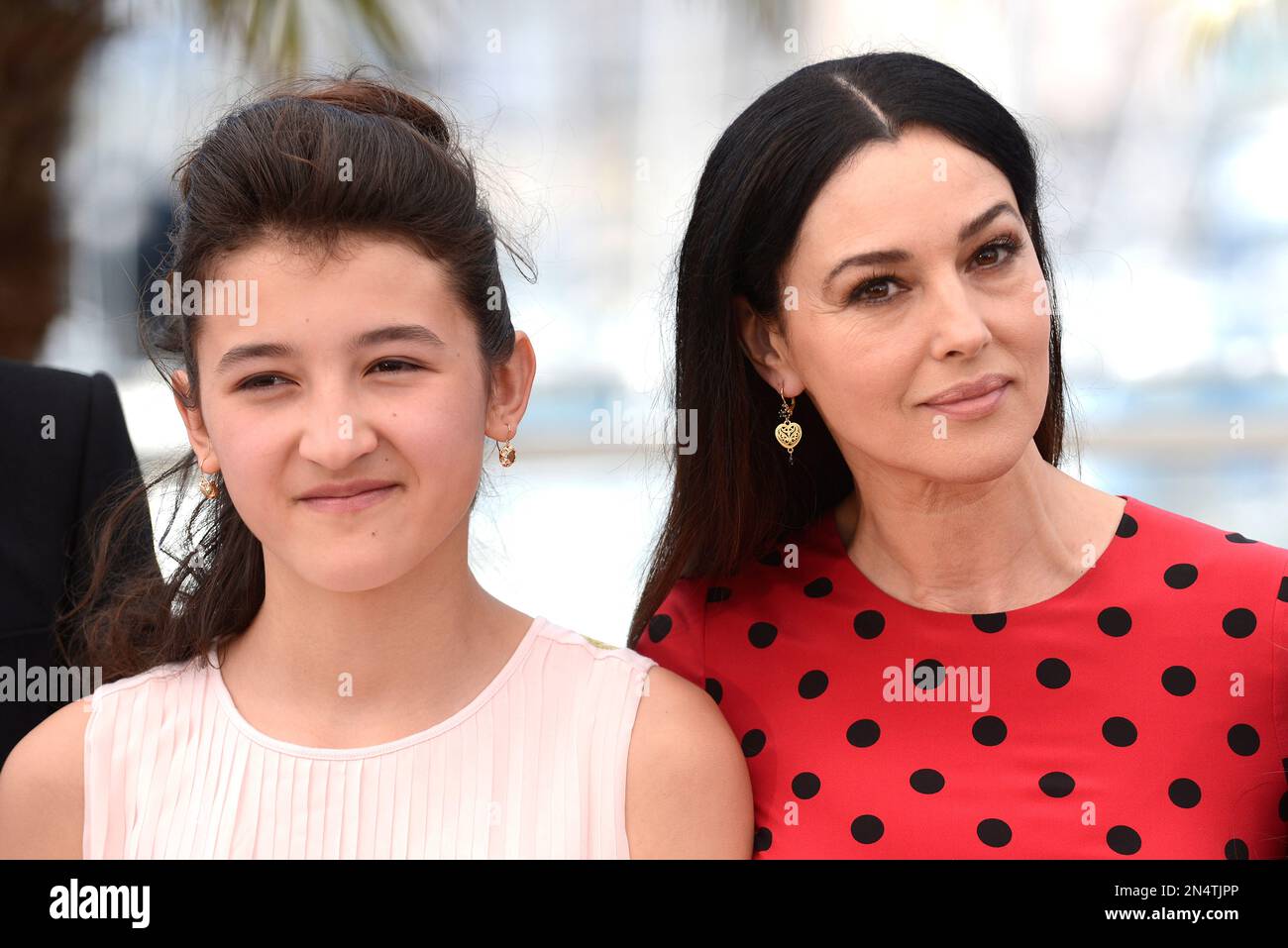 Actresses Maria Alexandra Lungu and Monica Bellucci pose for ...