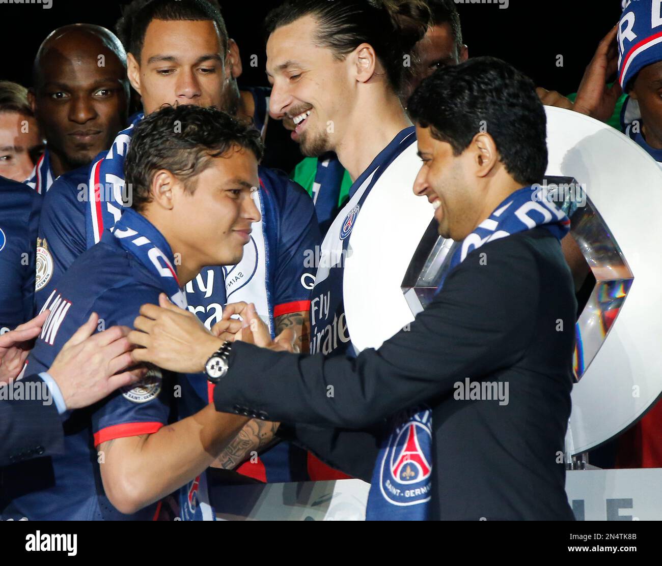 Paris Saint Germain's Brazilian defender Thiago Silva is congratulated ...