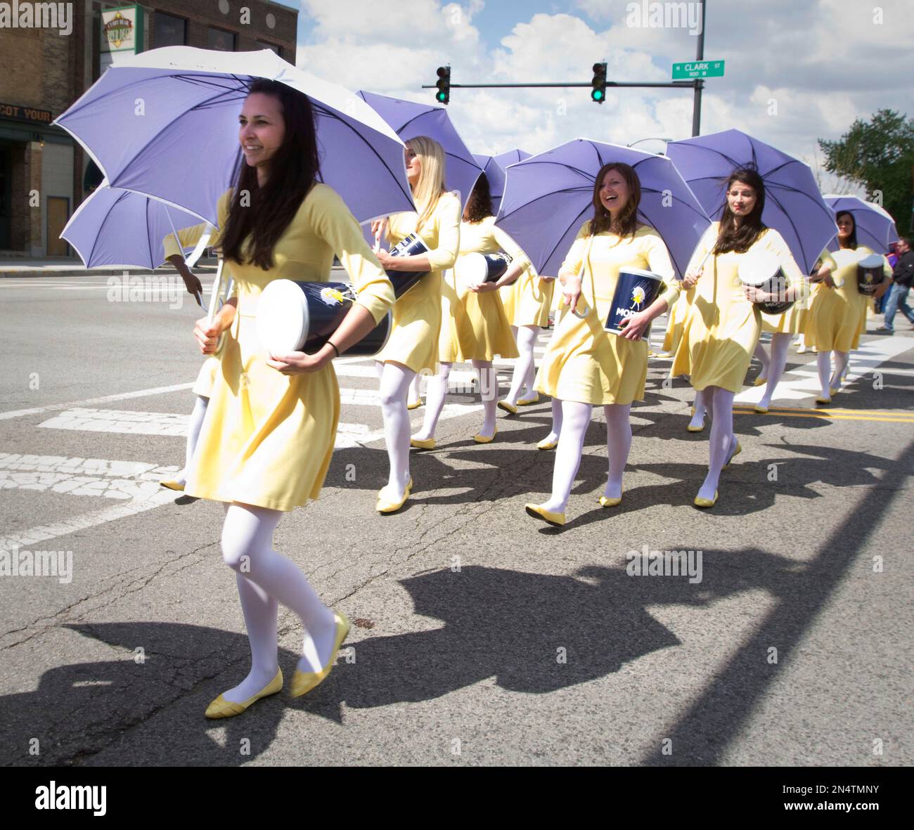 Morton Salt Girls walk across Clark Street outside Wrigley Field on ...